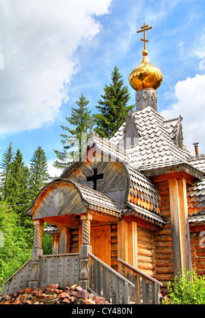 Small wooden russian-orthodox church. Wooden orthodox church against ...