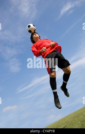 Soccer - Football Player making header Stock Photo - Alamy