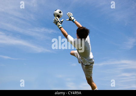 Soccer Football Goalie making diving save Stock Photo - Alamy