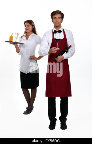 waiter and waitress at a test Stock Photo - Alamy