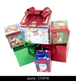 Boxed and decorated Christmas presents isolated on white background ...