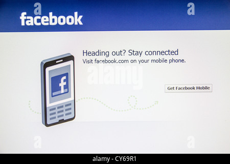 Facebook website display on computer screen Stock Photo - Alamy