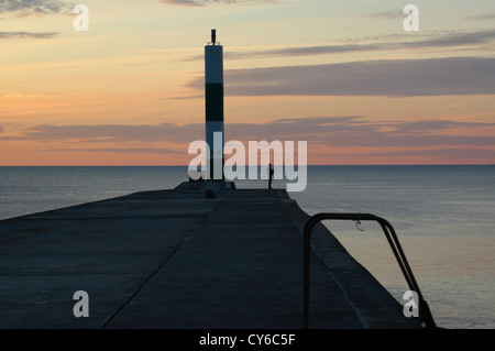 Aberystwyth stone jetty at sunset Stock Photo - Alamy
