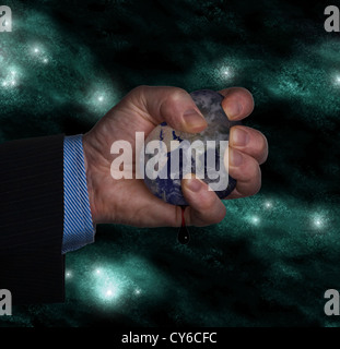 Hand squeezing oil from the planet. Earth image courtesy of NASA Stock ...