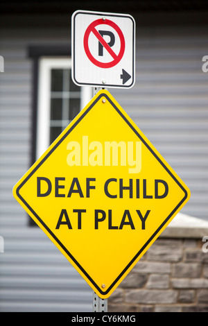 Deaf Child at Play Sign in Suburban Neighborhood Stock Photo - Alamy