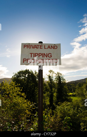 Fly tipping on private land Stock Photo - Alamy