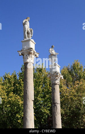 Statues of Hercules and Julius Caesar on pedestals in the Alameda de ...