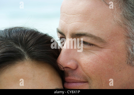 Two women nuzzling foreheads Stock Photo - Alamy