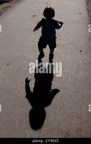 Shadow outline of a boy Stock Photo - Alamy
