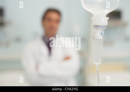 Phial in front of doctor in hospital bedroom Stock Photo - Alamy