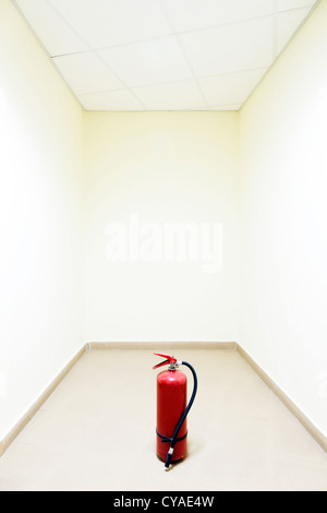 empty room with fire extinguisher Stock Photo - Alamy