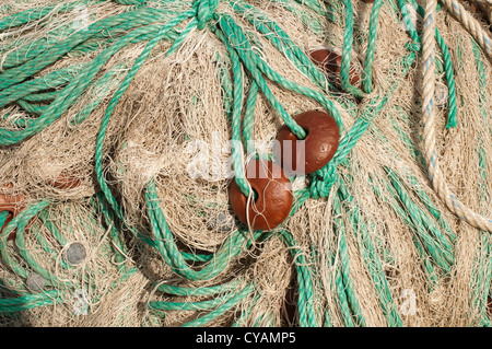 Beige color fishing nets background Stock Photo - Alamy