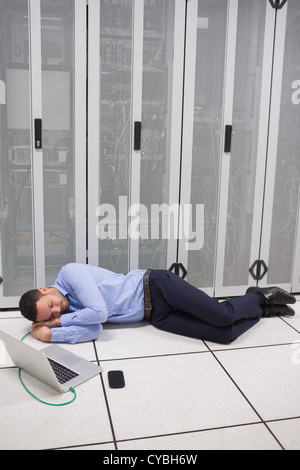 Man napping in data center Stock Photo - Alamy