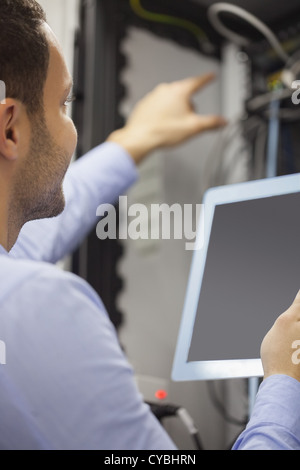 Close-up of man fixing network cables Stock Photo - Alamy