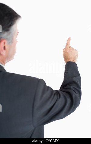 Business man pushing something on copy space isolated on white ...