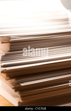 Stack of paper cards in yellow Stock Photo - Alamy