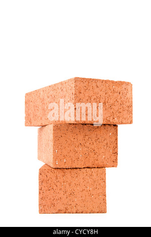 A stack of red clay bricks isolated on the floor Stock Photo - Alamy