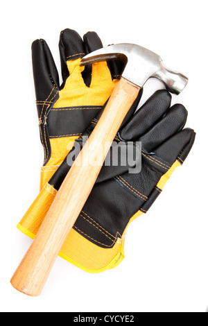 Pair of protective gloves claw hammer nails hard hat on wood board ...