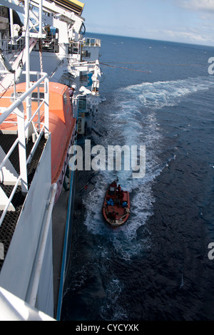 Work boat of the seismic vessel CGG Alize coming along side to be ...