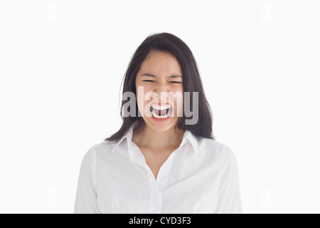 outraged young woman shouting and screaming and throwing a temper ...