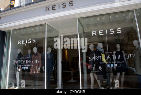 Window display of an upmarket ladies fashion clothing shop or boutique ...