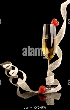 Glasses of champagne and red ribbons on golden background Stock Photo ...
