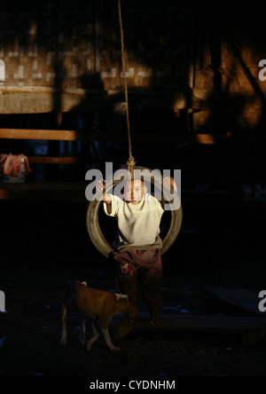 Kid Playing With A Tyre, Bagan, Myanmar Stock Photo - Alamy