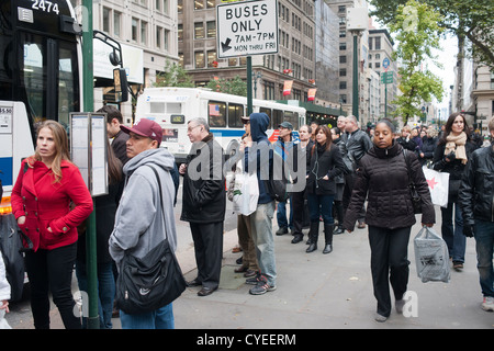 Commuters in New York contend with crowded buses, traffic and long ...