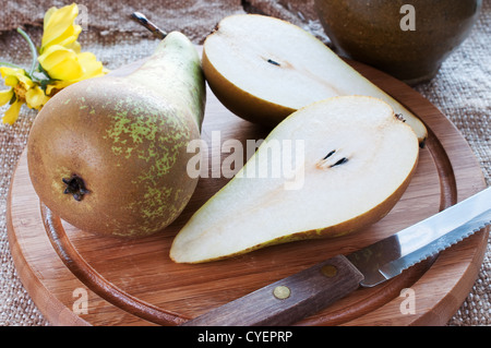 Fresh cutted pears on cutting board Stock Photo - Alamy