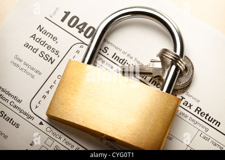 Tax form and key lock Stock Photo - Alamy