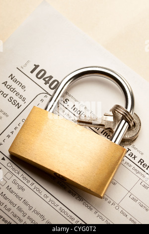 Tax form and key lock Stock Photo - Alamy