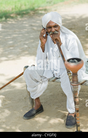 Farmer Smoking Hookah, Rural Life, Punjab, Pakistan Stock Photo - Alamy