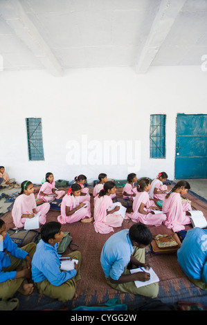 Rural Indian village high school teacher and children in an outside ...