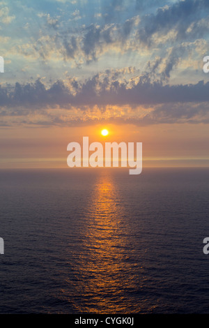 Sunset over the sea Stock Photo - Alamy