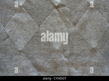 Knitted wool pattern rhomb form grey color background Stock Photo - Alamy