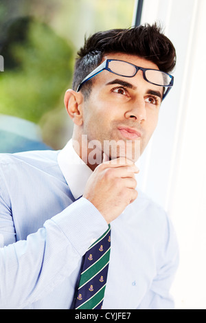 young business man thinking at the office Stock Photo - Alamy