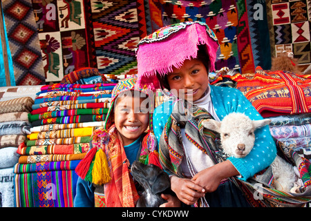 Peruvian Boy In Traditional Dress Playing A Wooden Flute Stock Photo ...