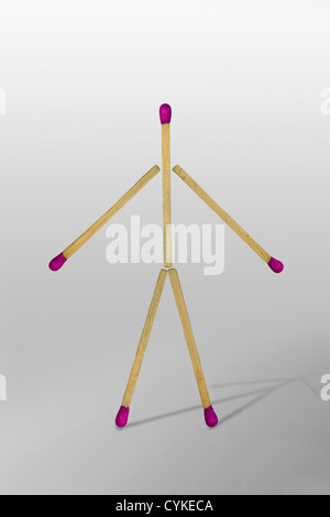 Matchstick in shape of man with head lit on fire Stock Photo - Alamy