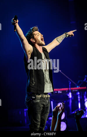 Danny O'Donoghue, lead vocalist of The Script, performs with the rest ...