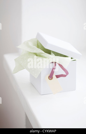 Close up of unwrapped gift box Stock Photo - Alamy