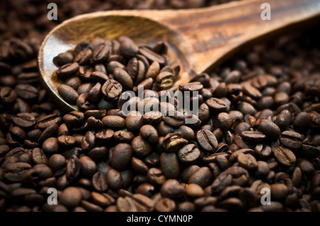 Coffee Addiction - Coffee beans spill from a prescription drug bottle ...