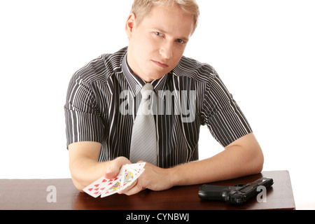 Young poker player with gun isolated on white Stock Photo - Alamy