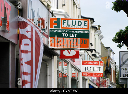 High street in Worthing town centre West Sussex with to let boards UK ...