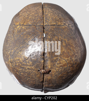 A skull trophy of the Melawi tribe,Borneo.Ornamentally engraved skull ...