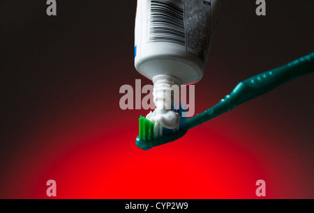 Wet Toothbrush with Toothpaste Isolated on White Stock Photo - Alamy