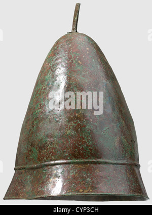 A bronze Pilos helmet, 4th century B.C. Tall, slightly bulging skull ...