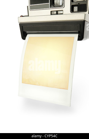 Retro camera and empty old instant paper photo on wood table - blank ...