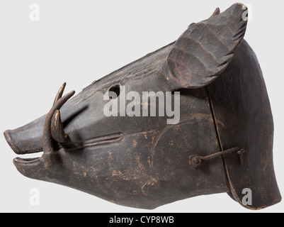 A German mask of shame,17th/18th century. Carved wooden mask in the ...
