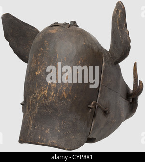 A German mask of shame,17th/18th century. Carved wooden mask in the ...