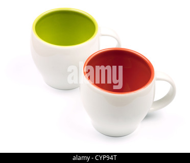 Two clean cups on color background Stock Photo - Alamy